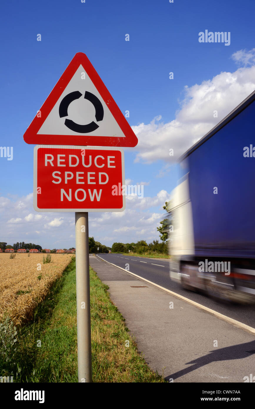 lorry passing reduce speed now warning sign and roundabout ahead uk ...