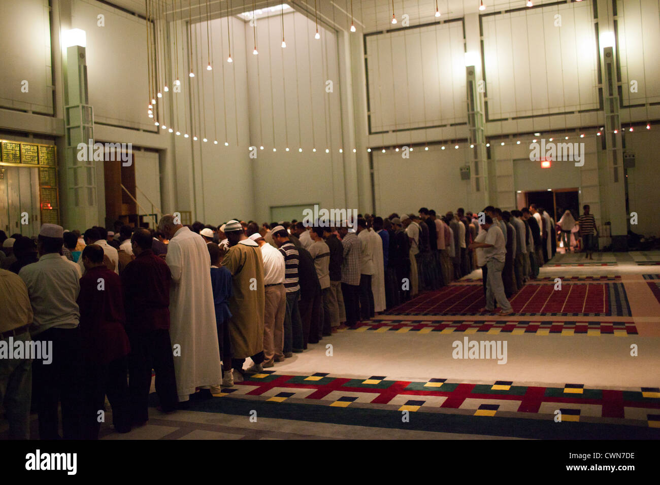 Muslim men pray at a mosque during the month of Ramadan in New York ...