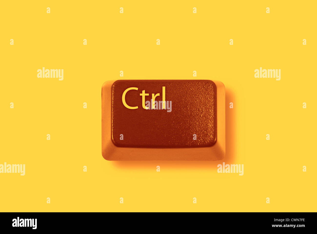 Red "CTRL" computer key on yellow background Stock Photo - Alamy
