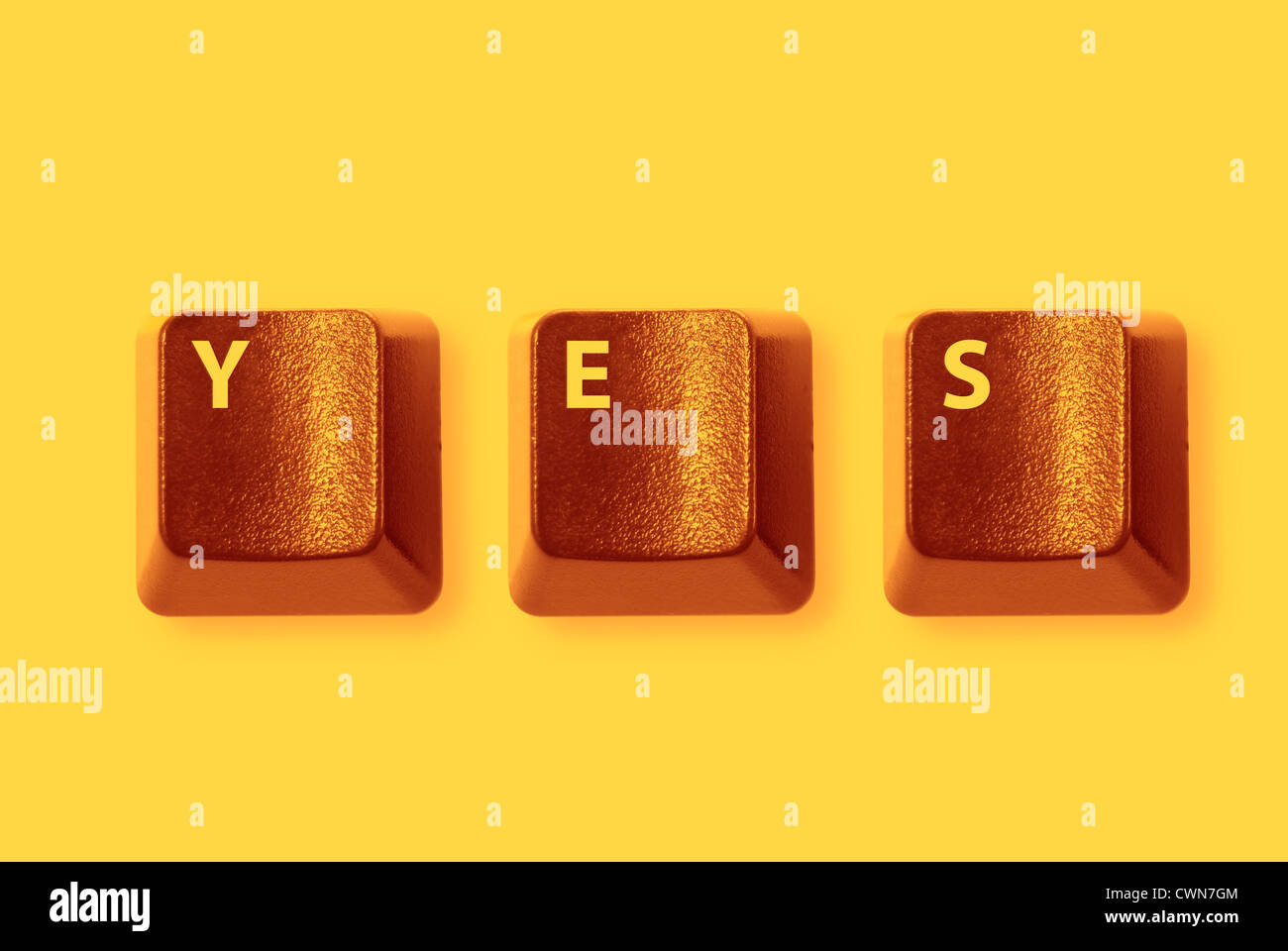 Red computer keys spelling "YES", on yellow background Stock Photo - Alamy