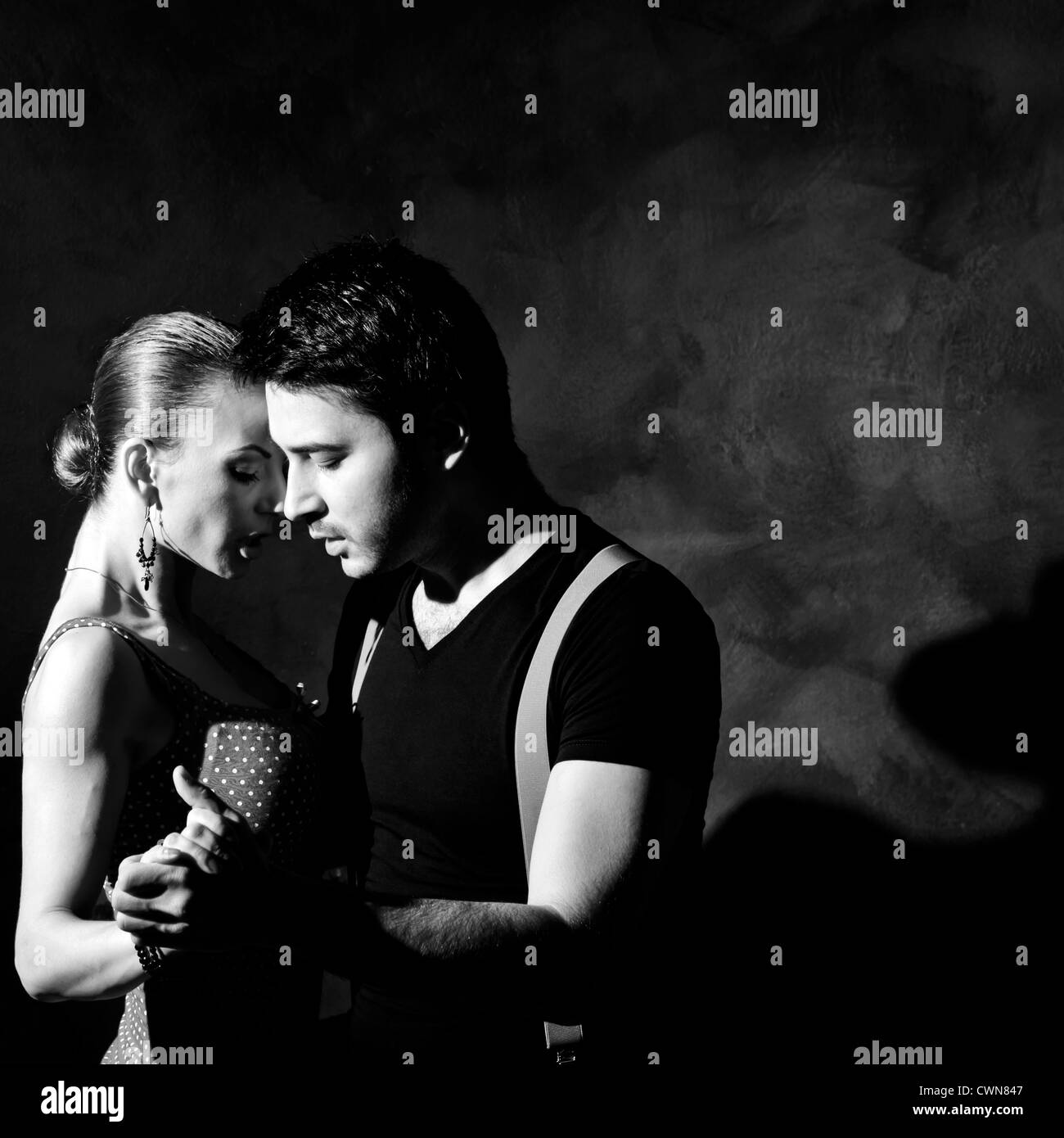 A man and a woman in the most romantic dance: tango. Please see more ...