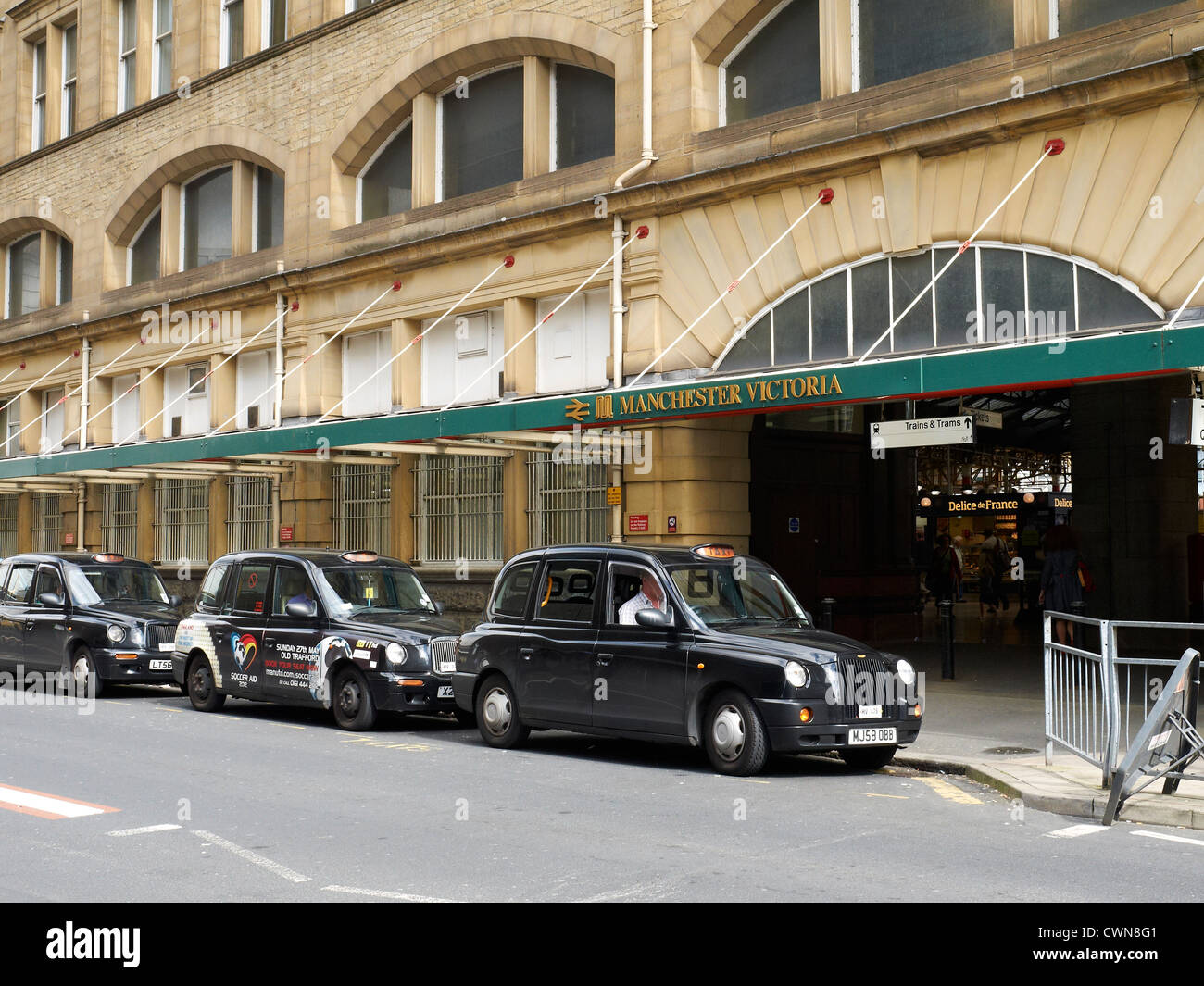 Taxi rank at Victoria Station in Manchester UK Stock Photo - Alamy