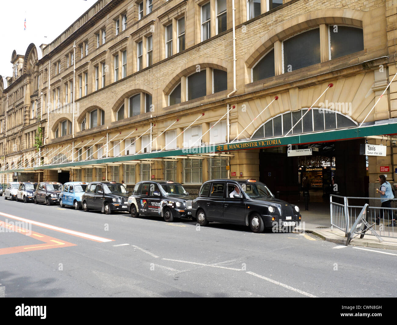 Taxi rank at Victoria Station in Manchester UK Stock Photo - Alamy
