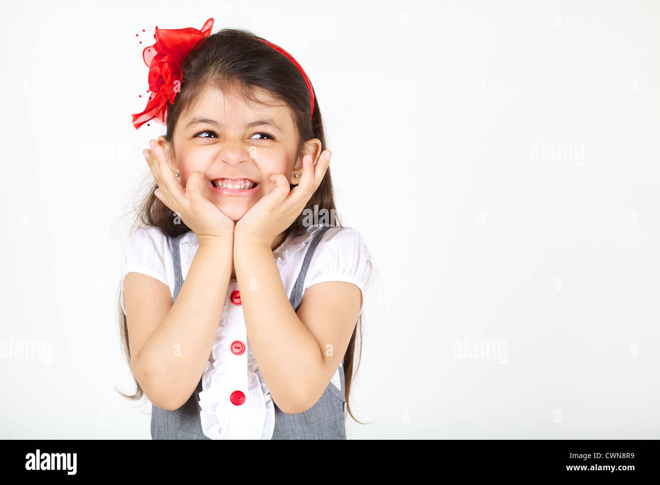 A cute young girl showing her facial expressions Stock Photo - Alamy