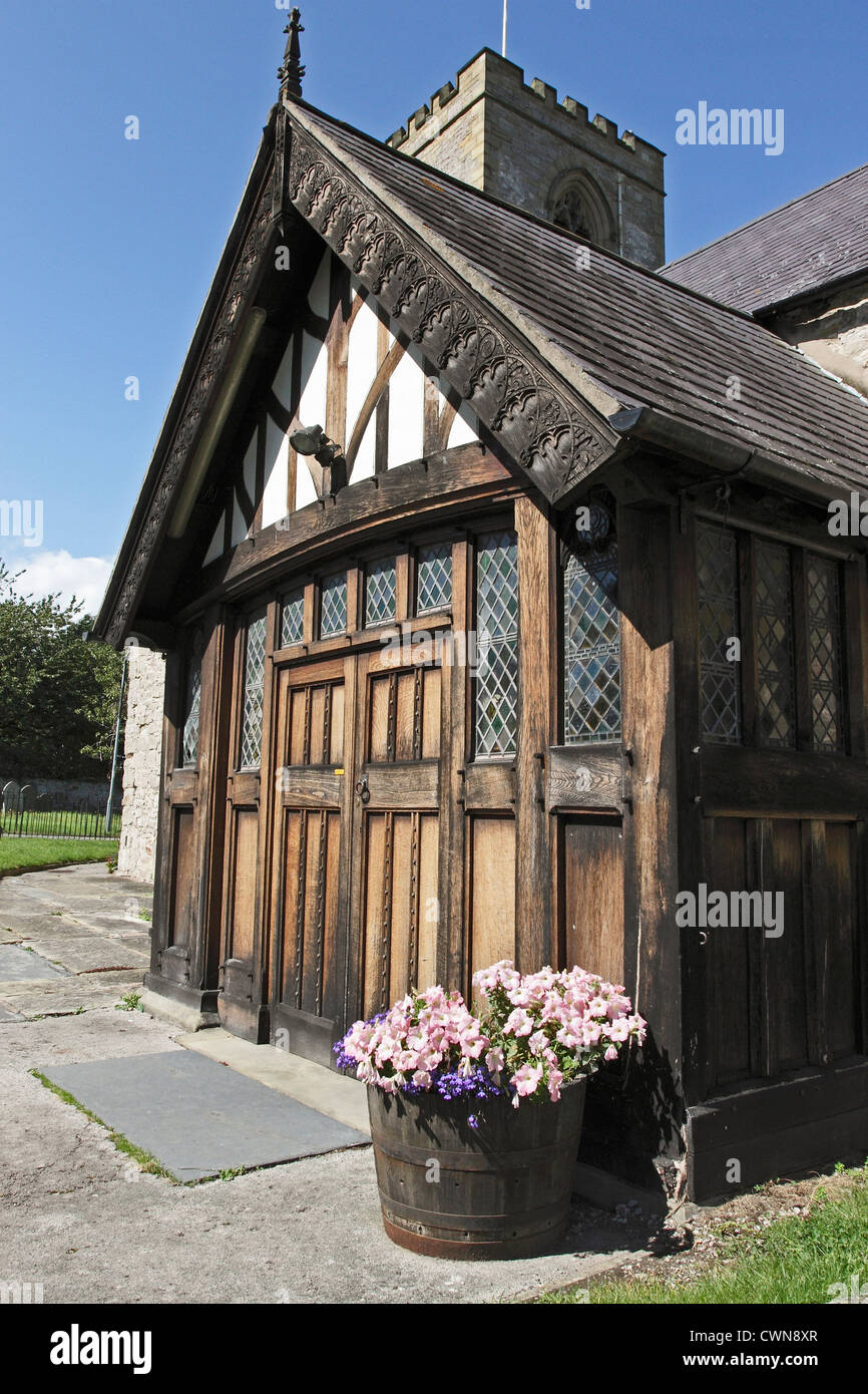 The ornate carved wooden porch at the entrance to St Michael's Parish ...