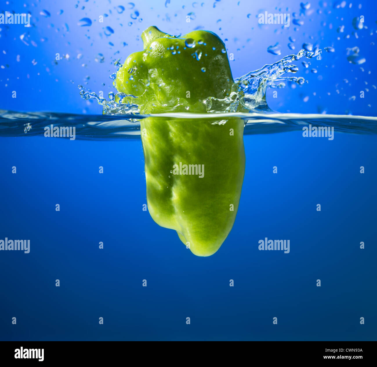 Fresh paprika in water splash Stock Photo - Alamy