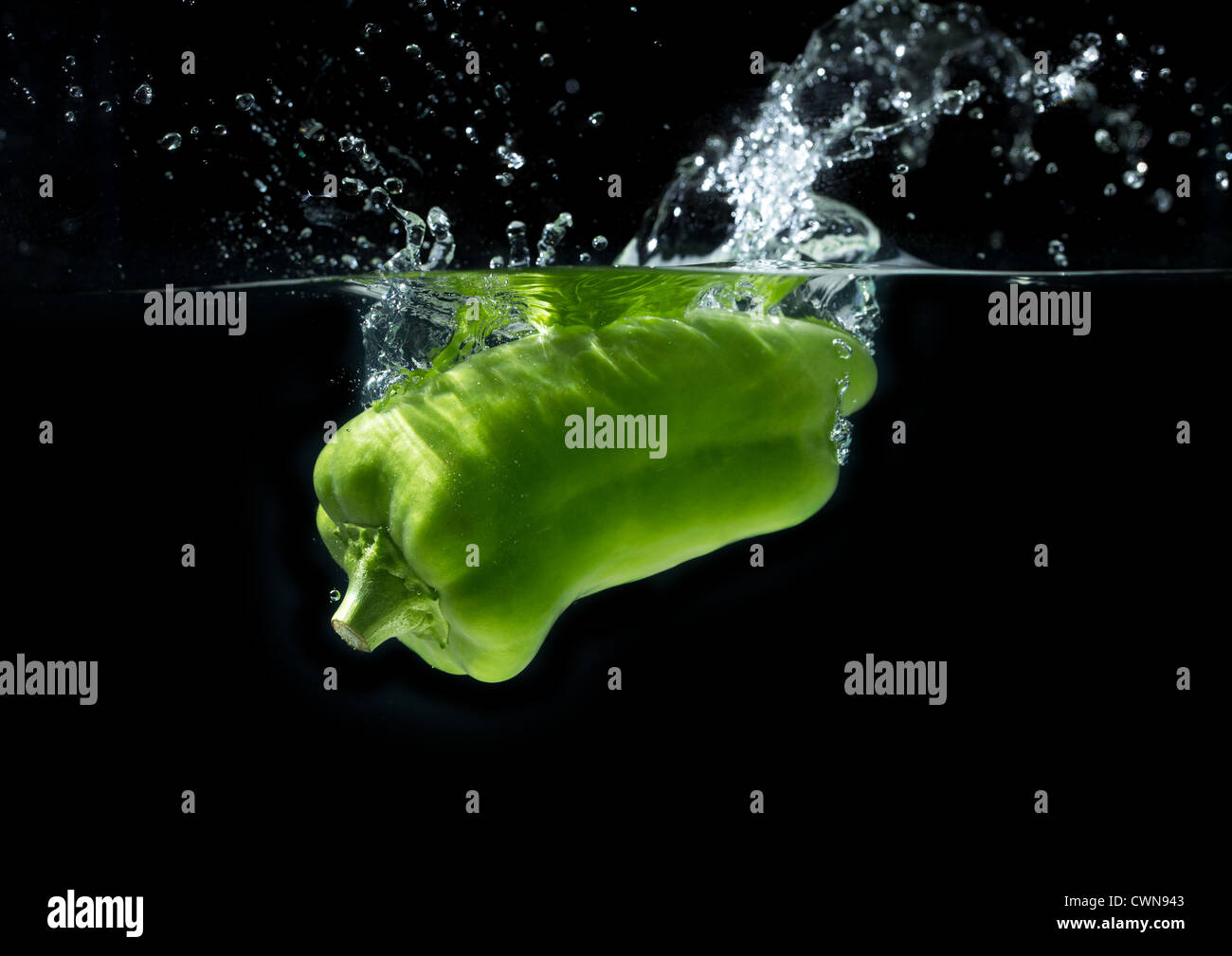 Fresh paprika in water splash Stock Photo - Alamy