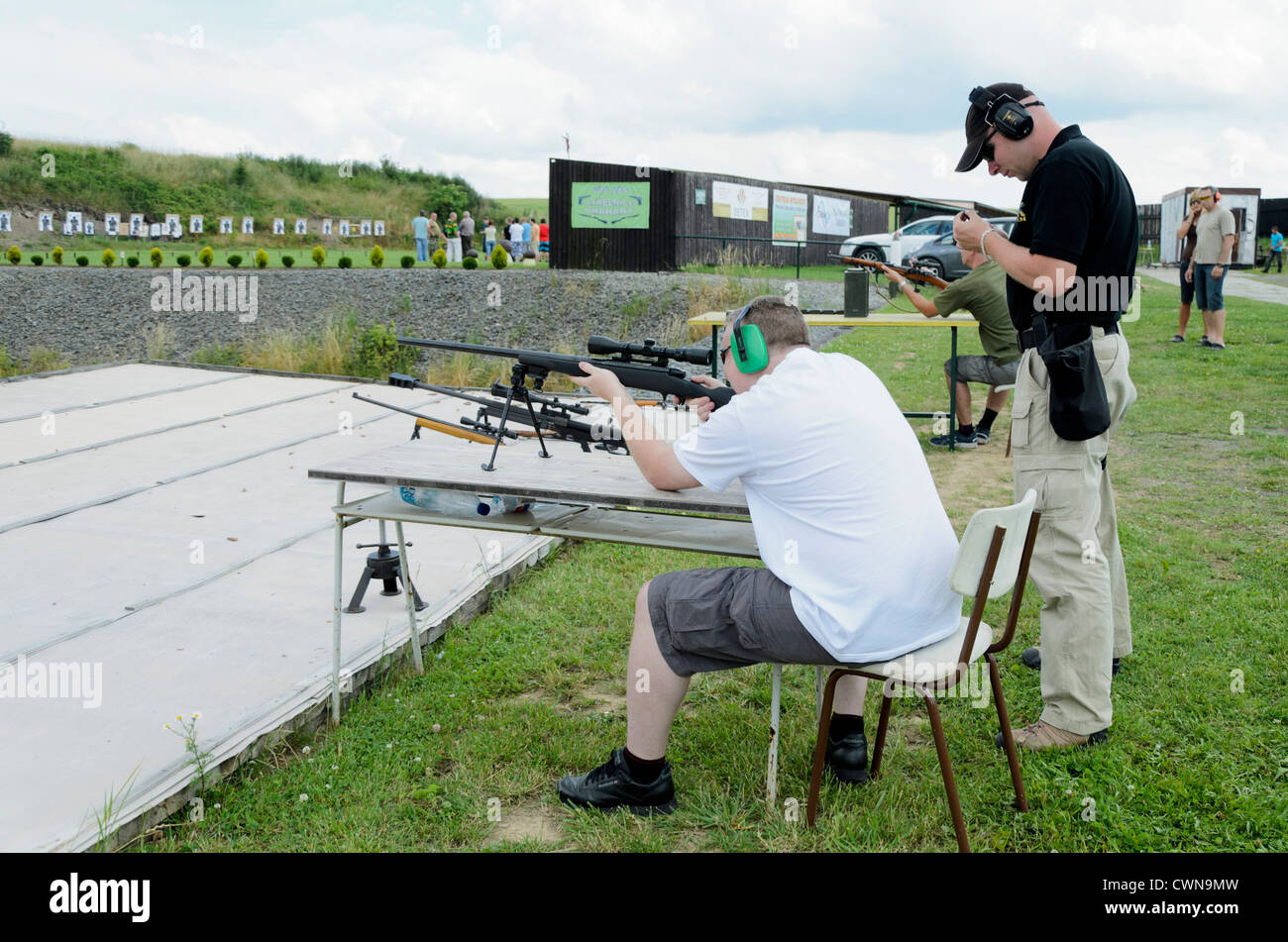 Man with rifle hi-res stock photography and images - Alamy