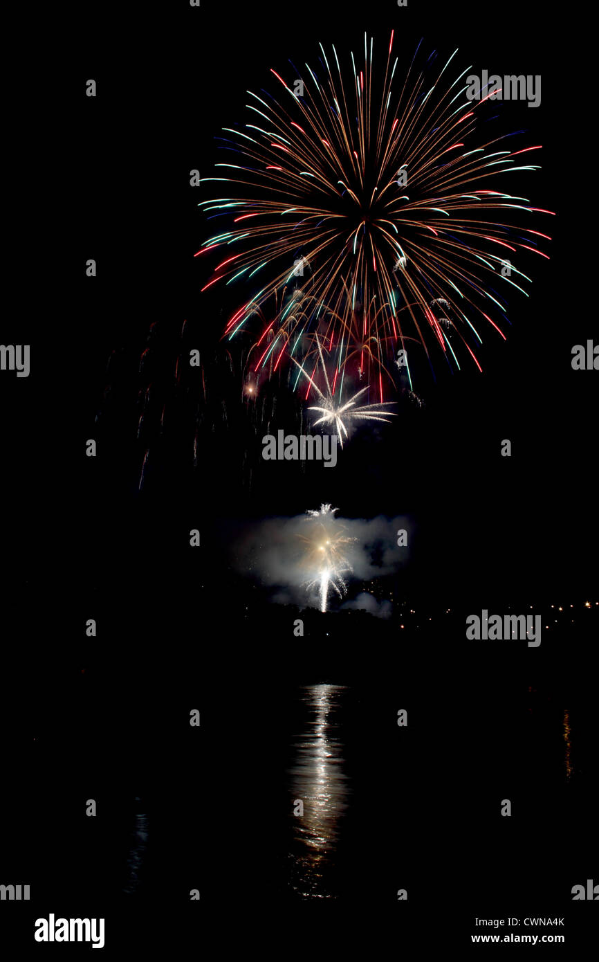 A photograph of a fireworks display at night Stock Photo - Alamy