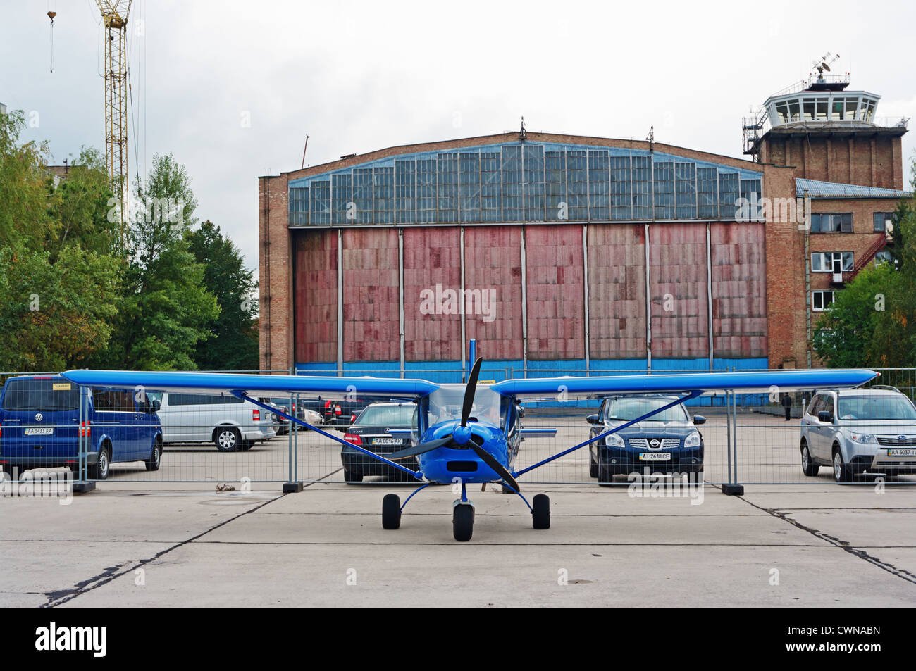 Light airplane for cruising and training on blue colour - front view ...