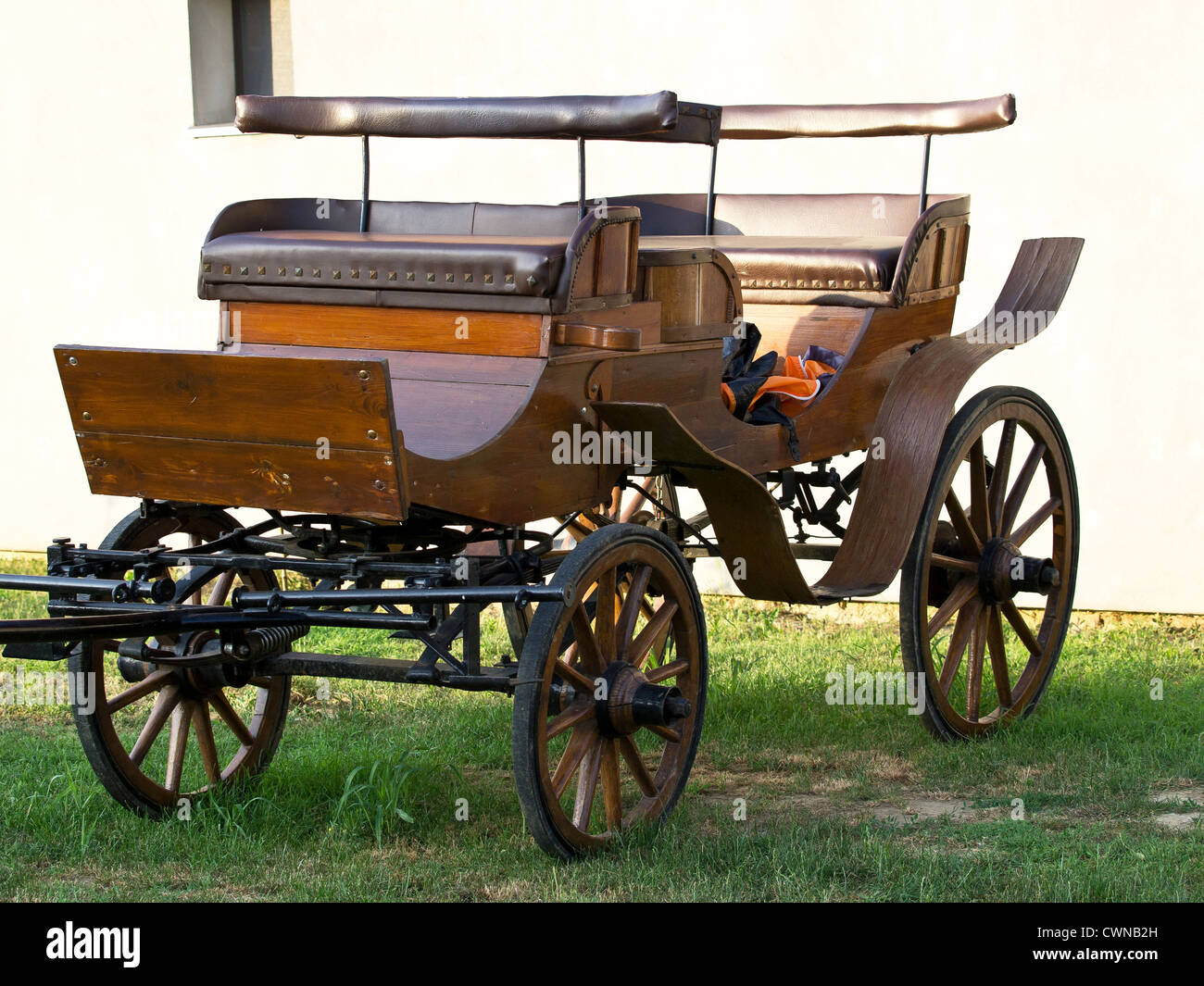 old wooden coach on the green grass Stock Photo - Alamy