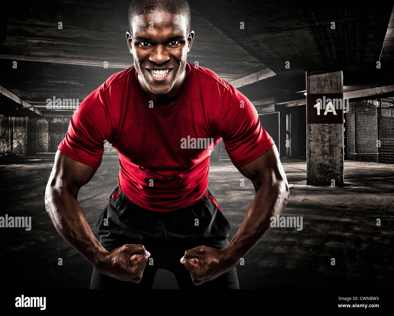 A athletic African American man with strong muscles Stock Photo - Alamy