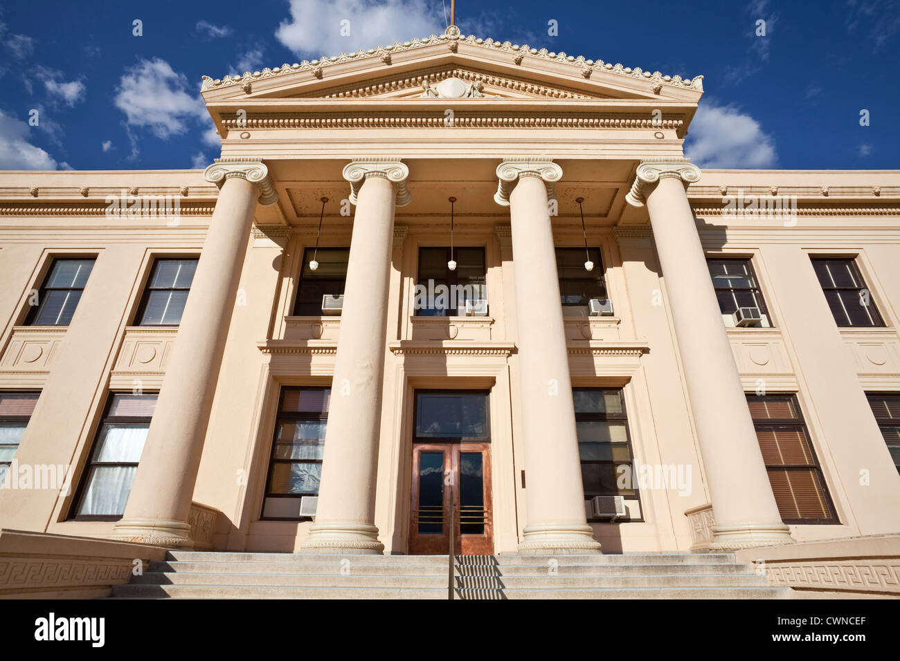Warm afternoon light on County courthouse steps in rural central ...
