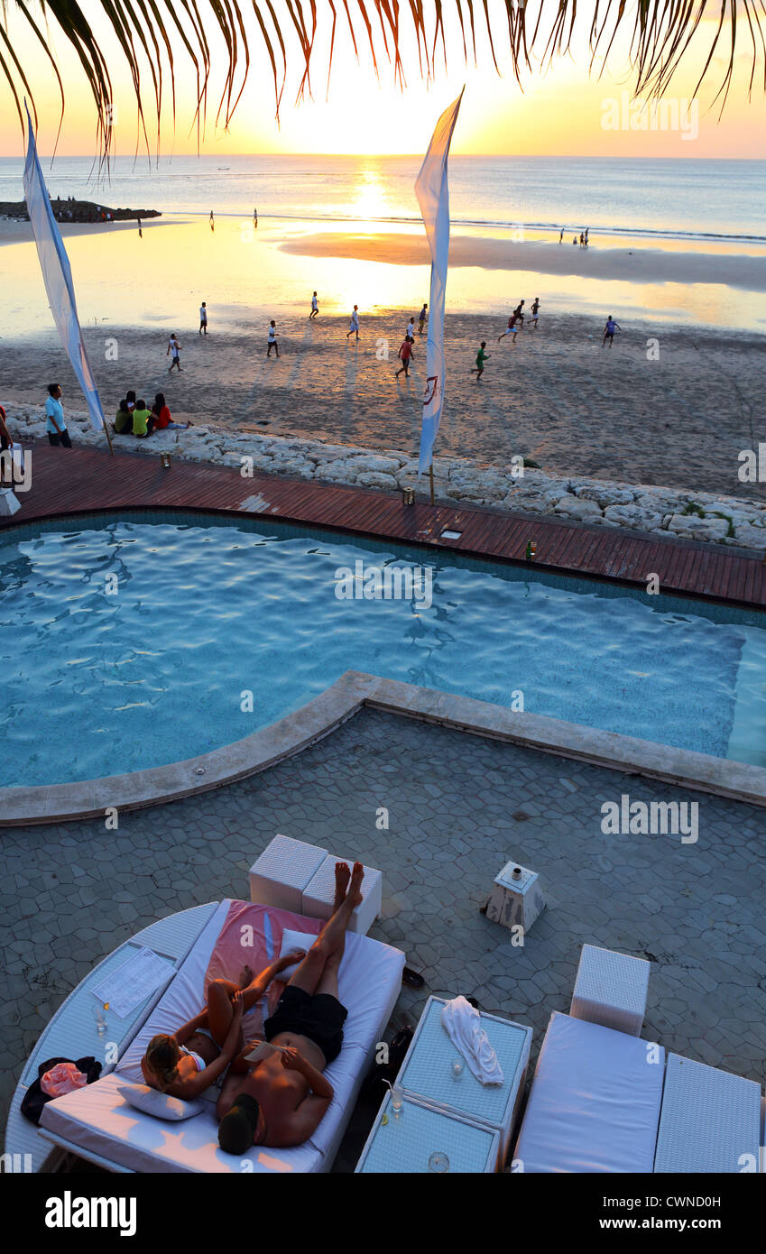 Sunset on Kuta Beach in Bali Stock Photo - Alamy