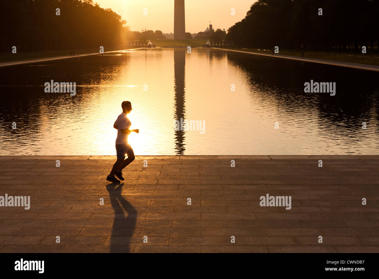 Jogger silhouette in early morning light - Washington, DC USA Stock ...