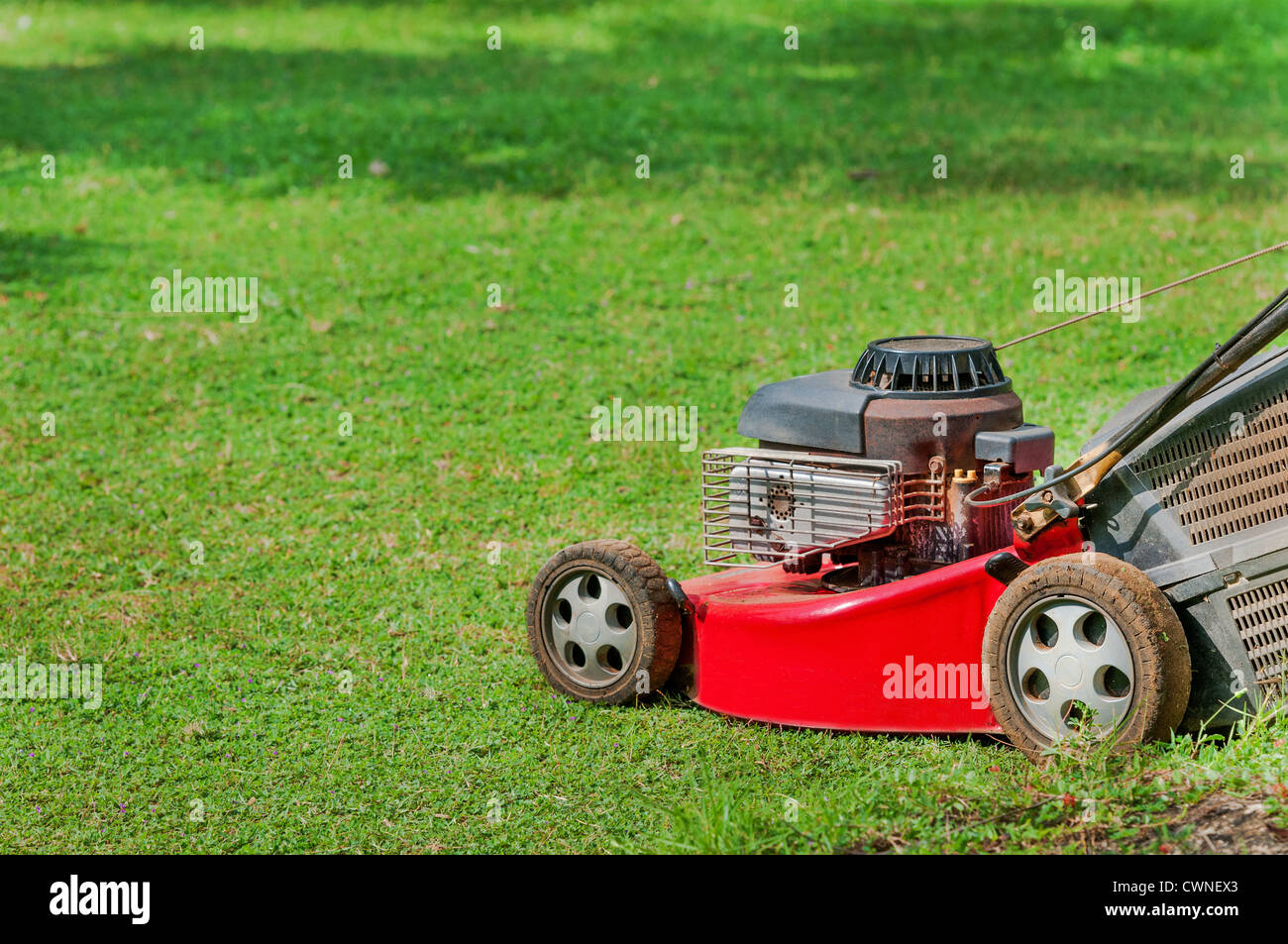 Lawn mower outside in grass hi-res stock photography and images - Alamy
