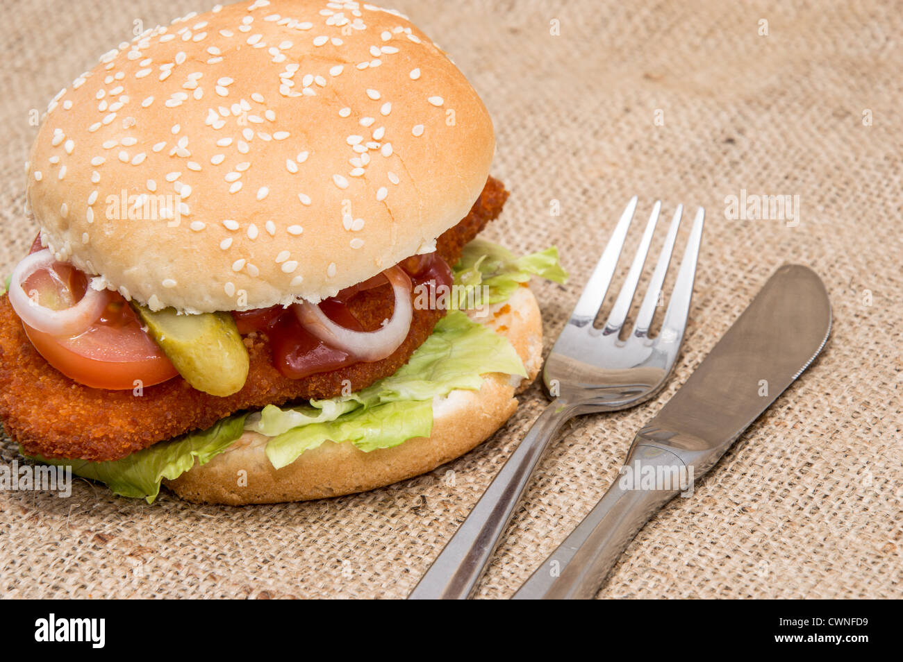 Chicken Burger on rustic background (macro view Stock Photo - Alamy