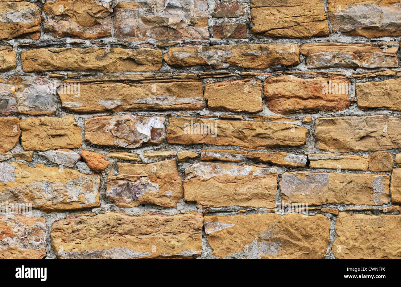 Wall made of stones Stock Photo - Alamy