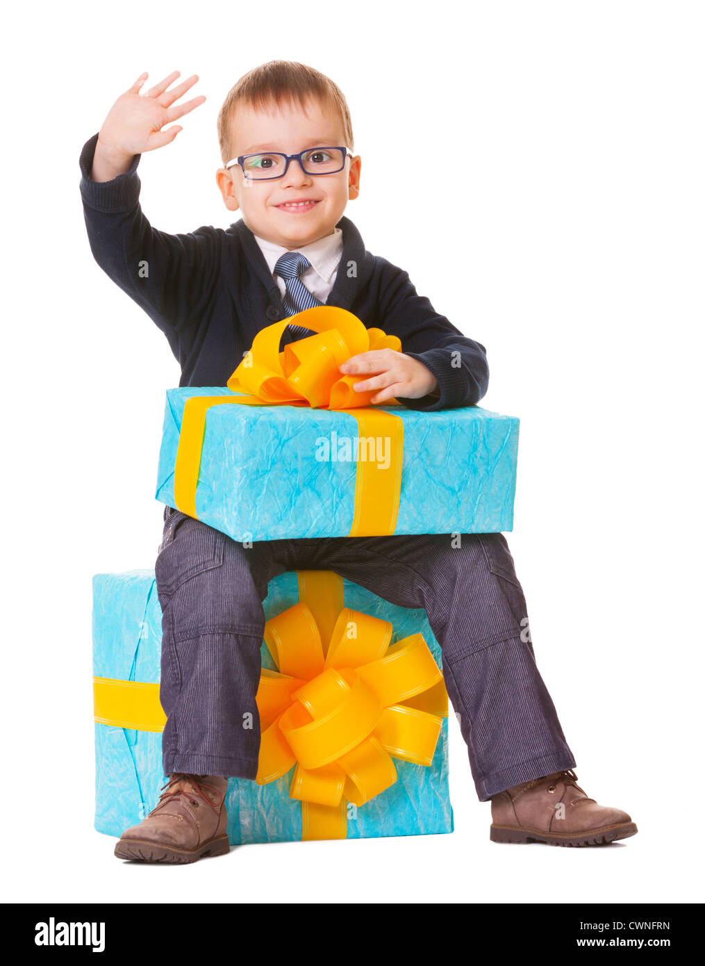 Small boy in spectacles with big present on white background Stock ...