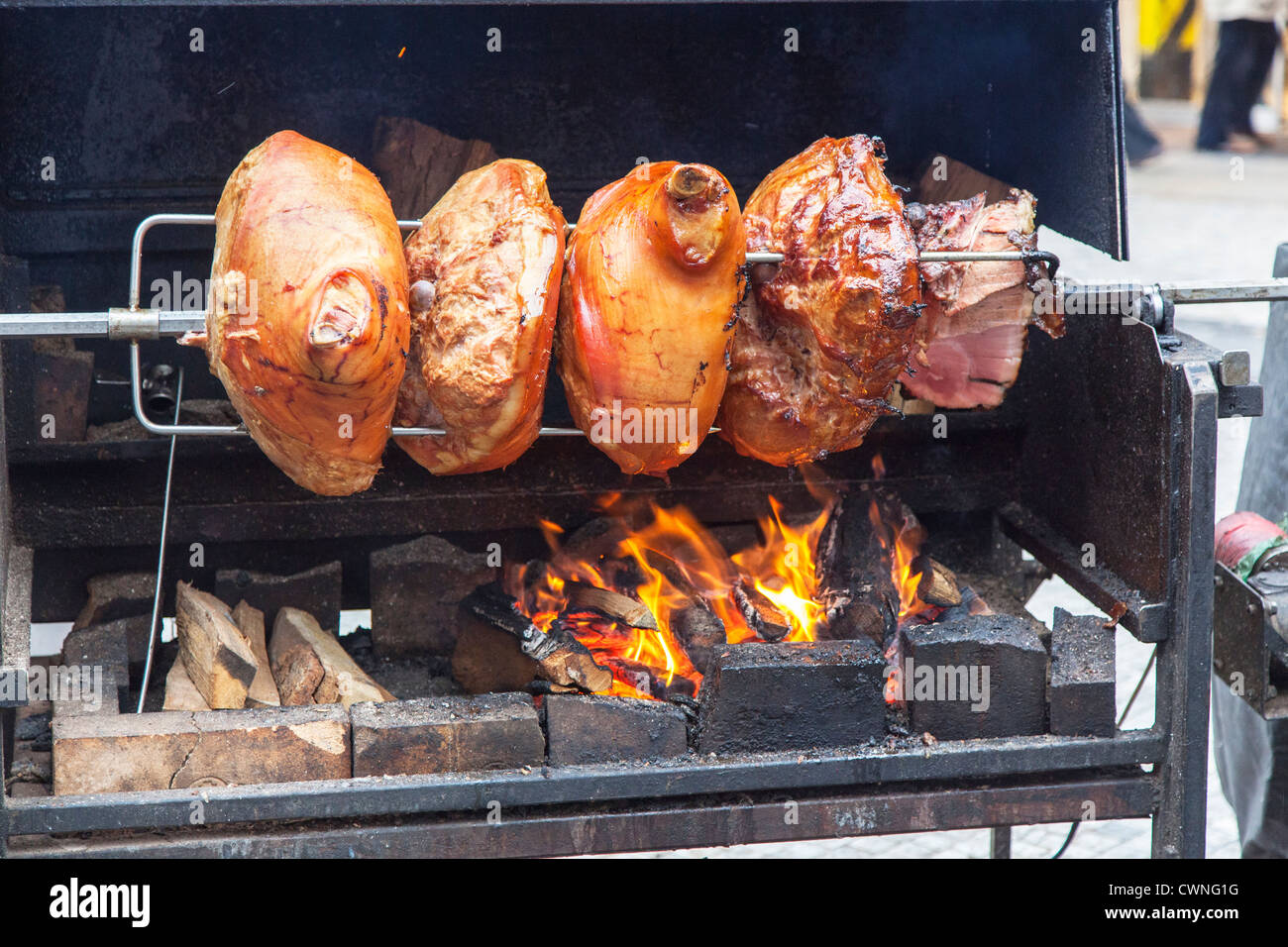 Christmas and New Year market in Prague, Czech Republic - hams roasting ...