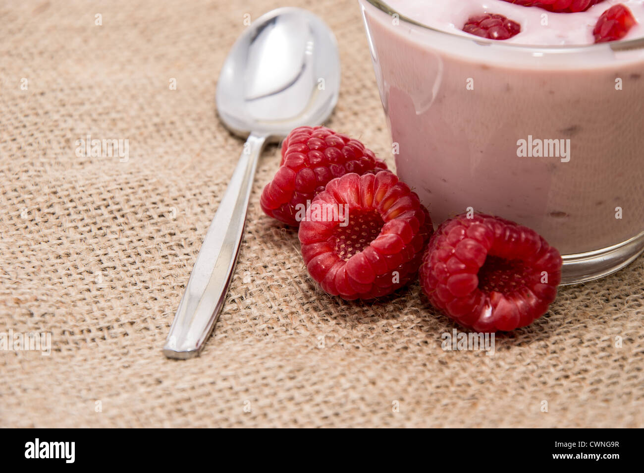 Fresh made Rasperry Yogurt on rustic background Stock Photo - Alamy