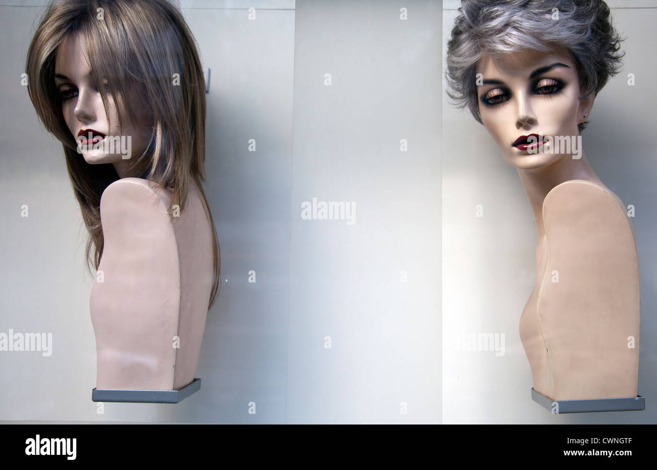 Wigs in Shop Window Display Stock Photo - Alamy