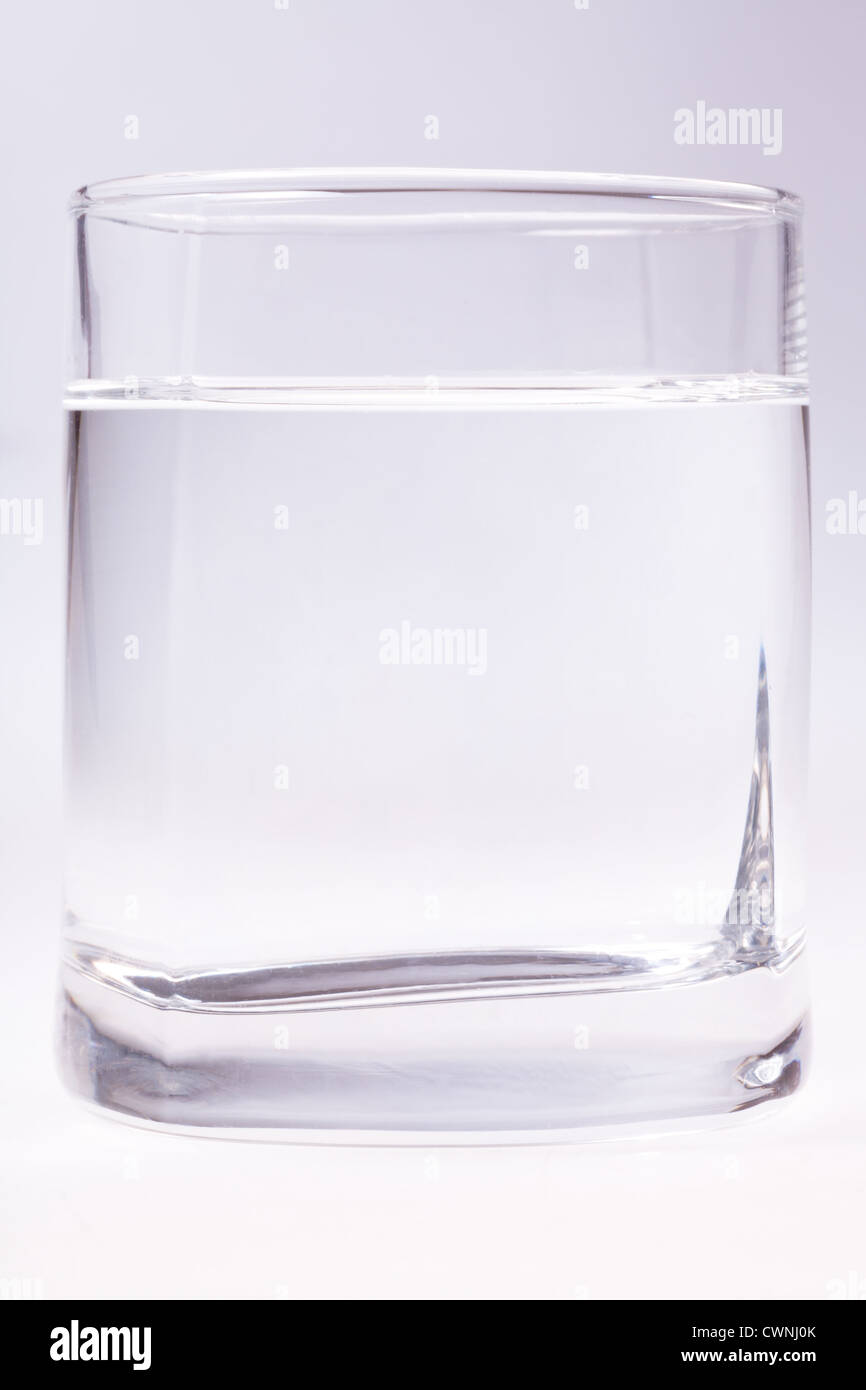 glass of clear water on grey background Stock Photo - Alamy