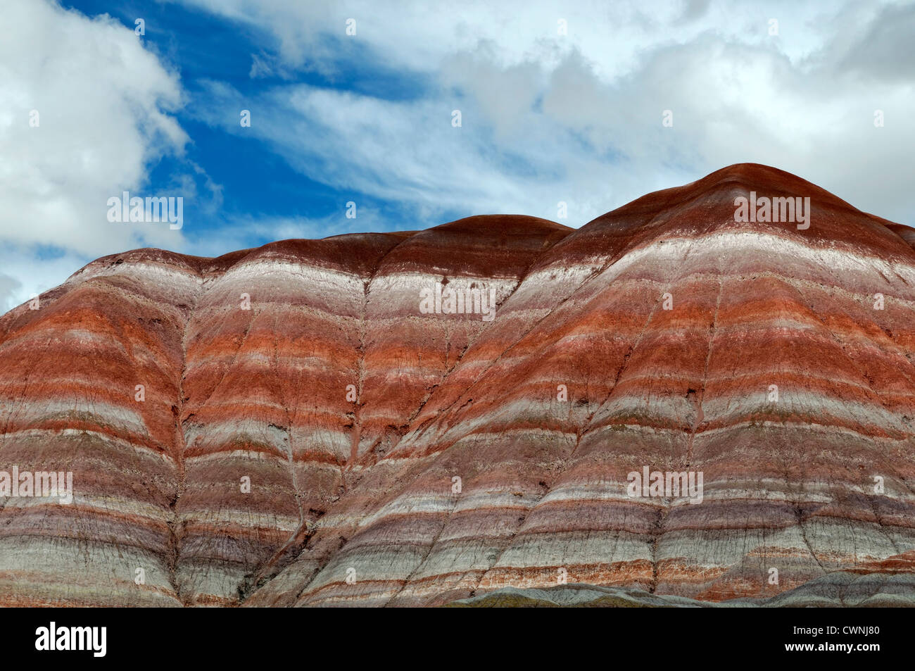 orange brown red colored coloured sandstone cliffs hills along highway ...