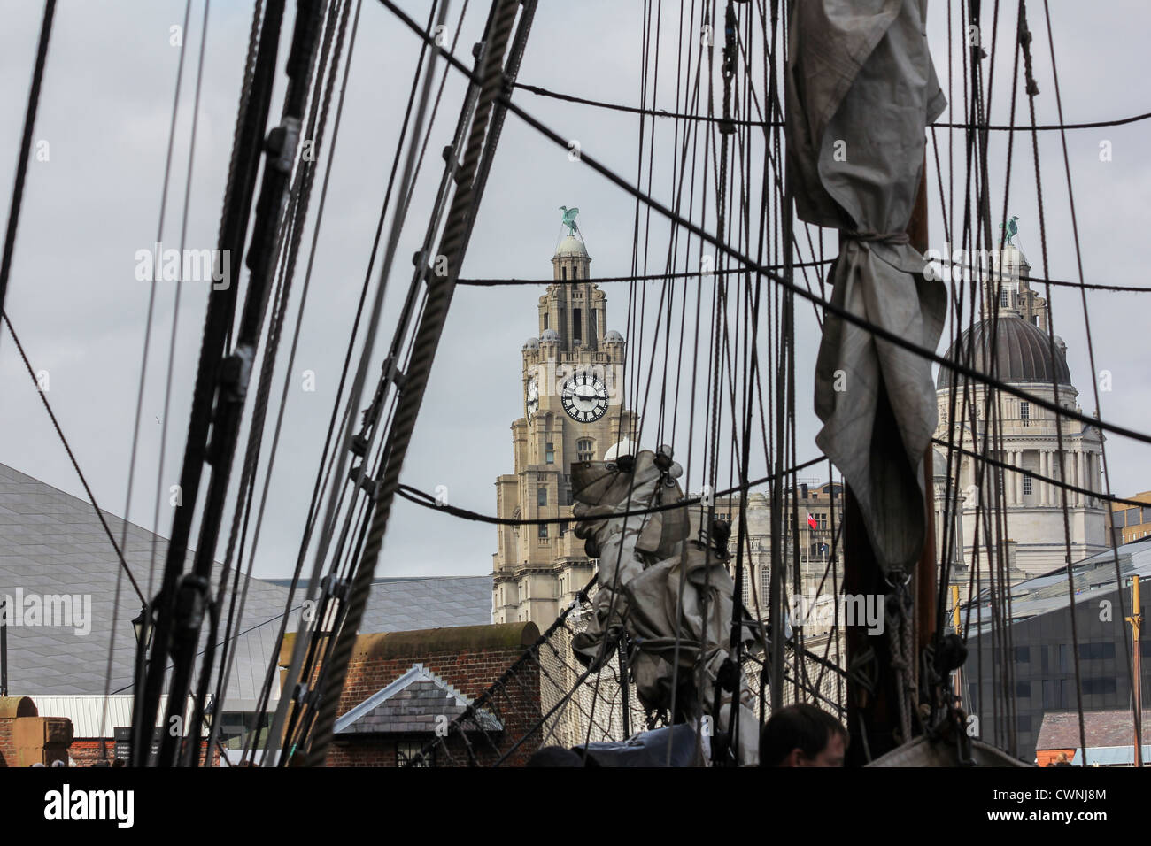 The famous Royal Liver Building seen through the ropes of a tall ship ...