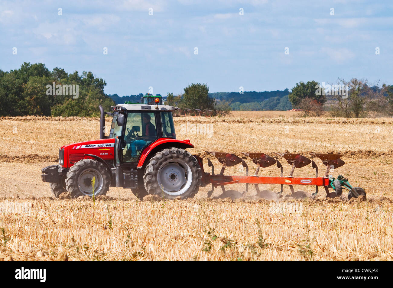Massey Ferguson 6445 Dynashift tractor plowing - sud-Touraine, France ...