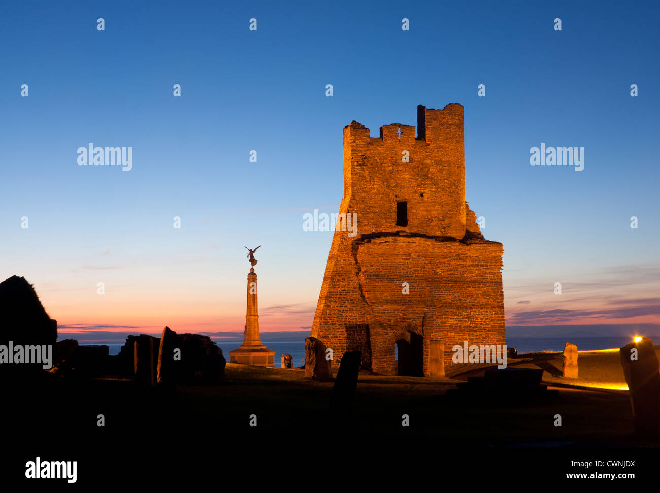Aberystwyth Castle at night with War Memorial and Cardigan Bay in ...