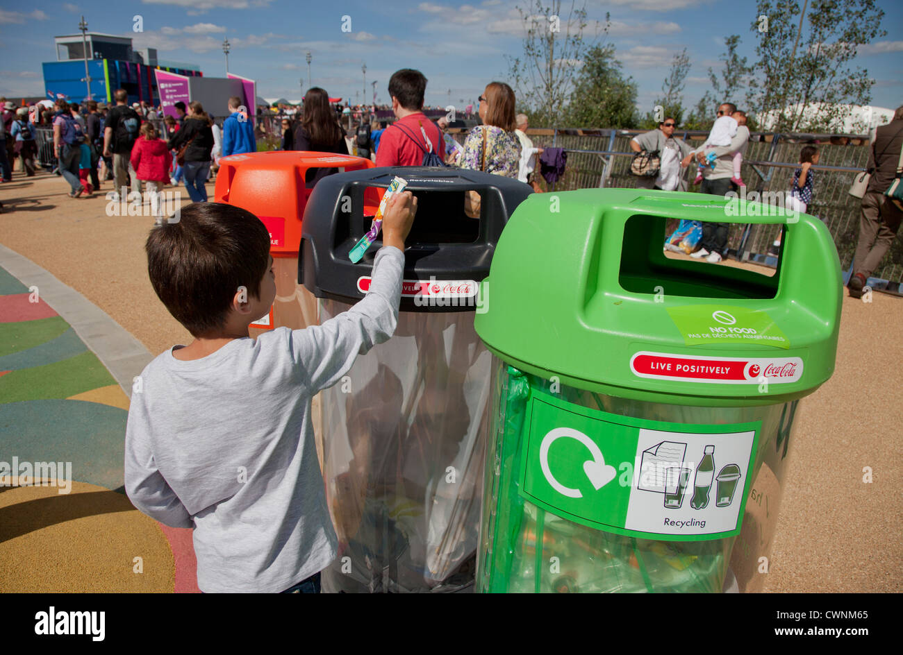Child using recycle bins at the London 2012 Olympic Stadium Stock Photo ...