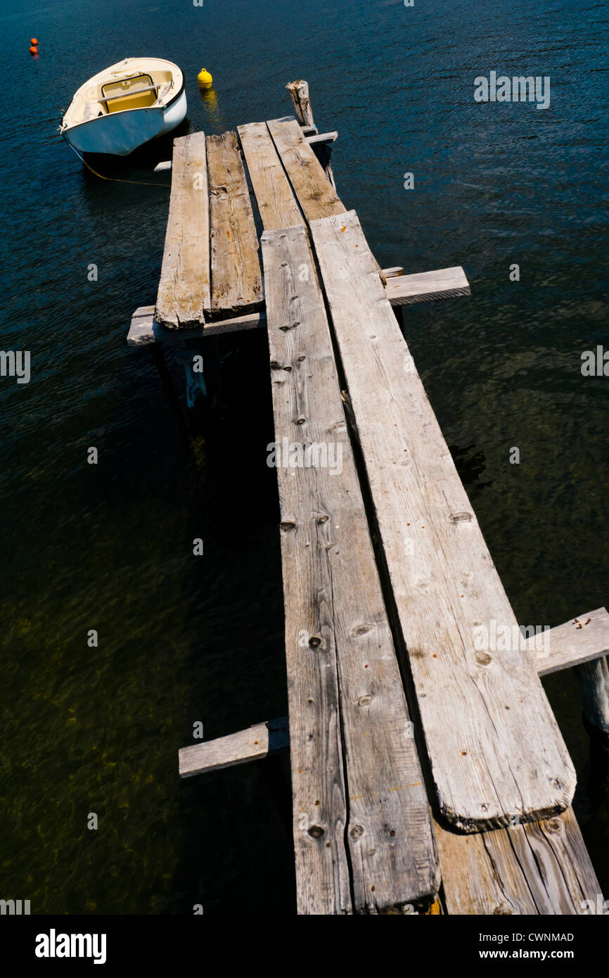 Wooden pier with boat hi-res stock photography and images - Alamy