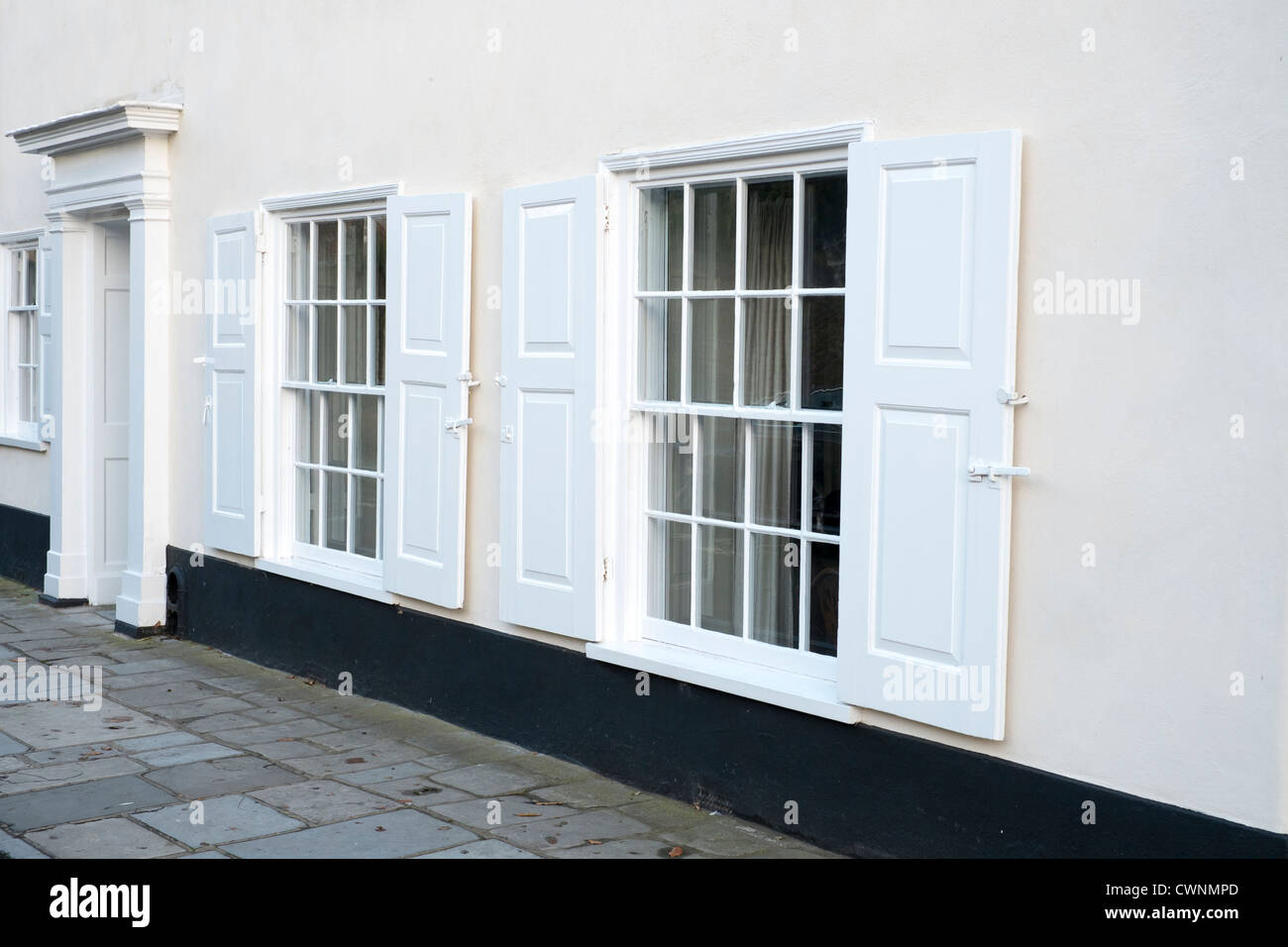 White painted wooden window shutters Stock Photo - Alamy