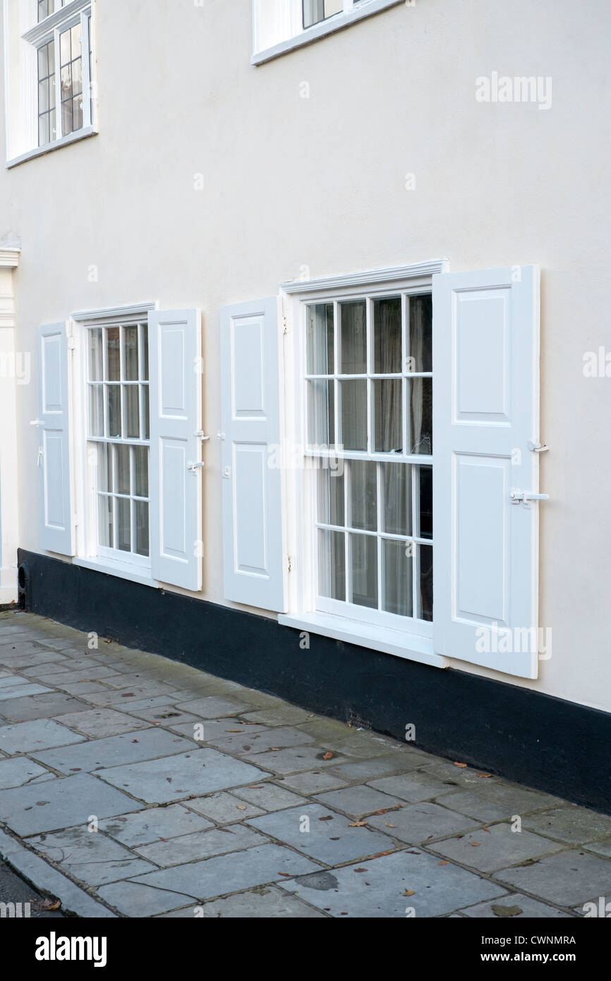 White painted wooden window shutters Stock Photo - Alamy