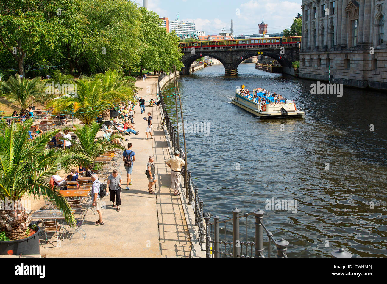 Europe, Germany, Berlin, Riverside cafe overlooking the River Spree ...