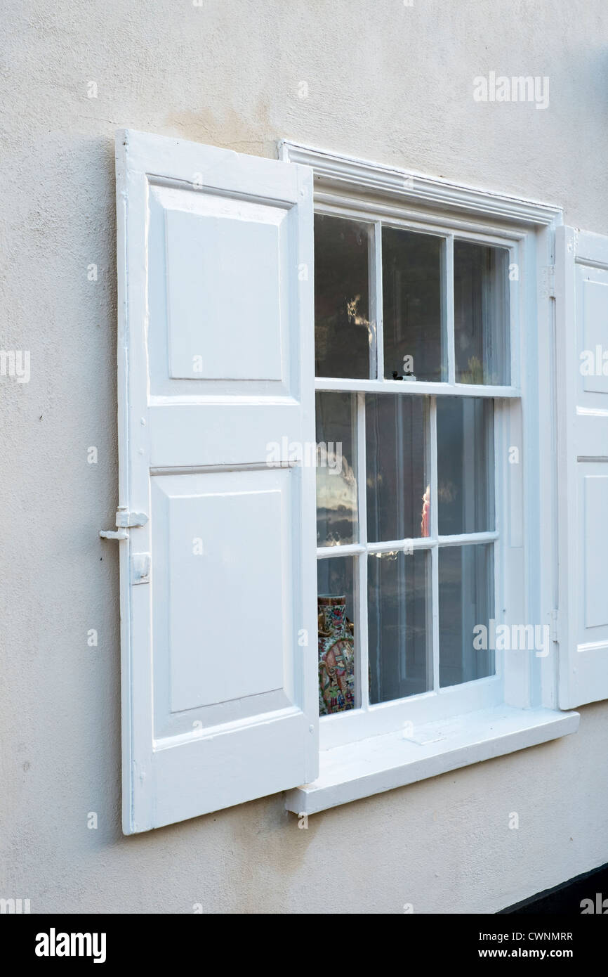 White painted wooden window shutters Stock Photo - Alamy