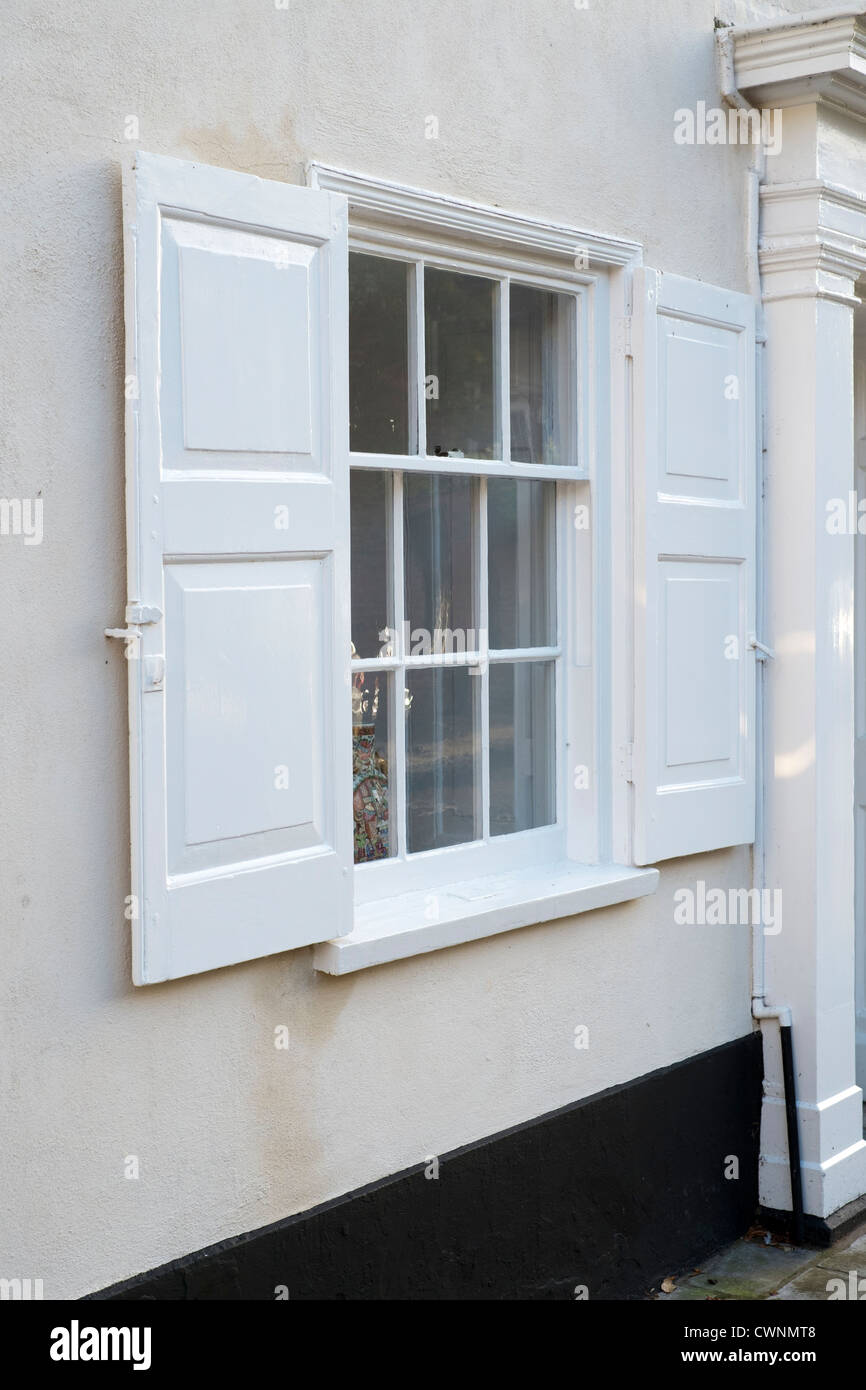 White painted wooden window shutters Stock Photo - Alamy