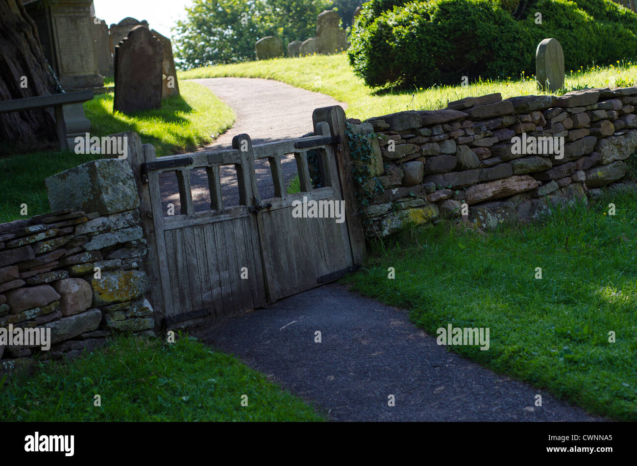 Old handcrafted, wooden double gate, in traditional dry stone stone ...