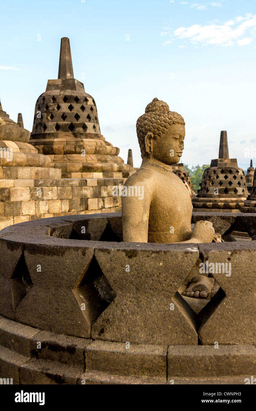 Buddha statue inside one of Borobudur temple stupas, Java island ...