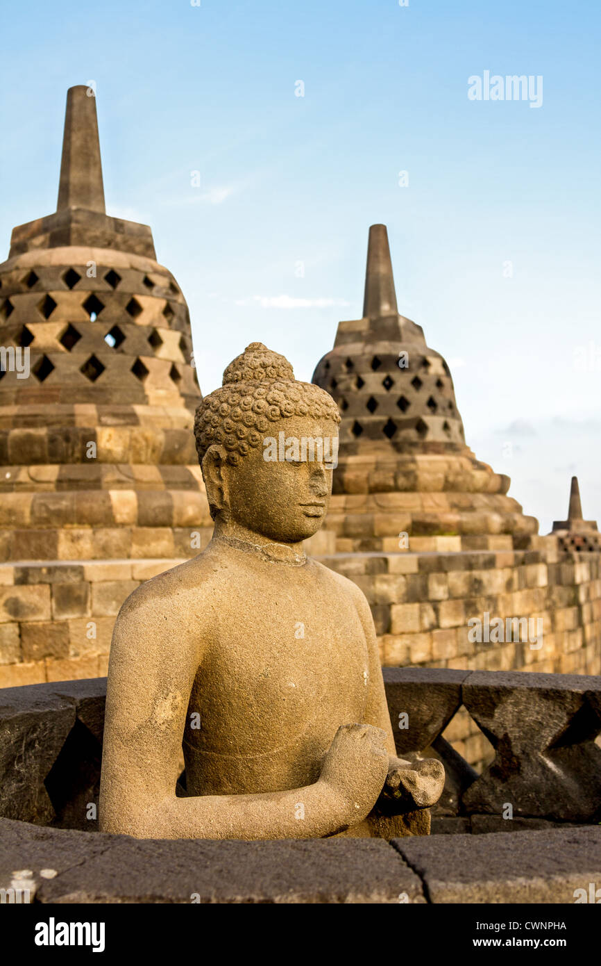Buddha statue inside one of Borobudur temple stupas, Java island ...