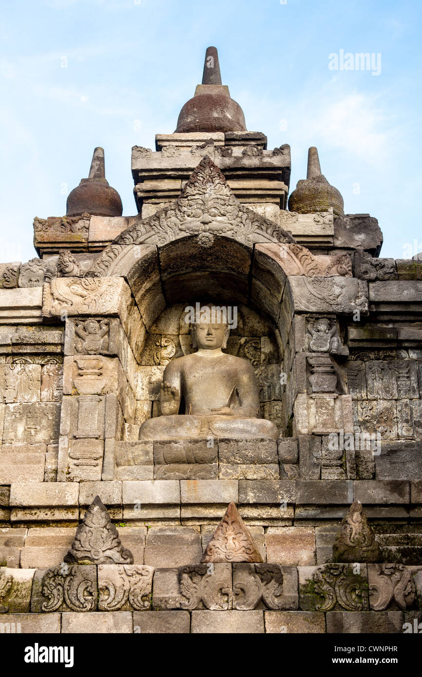 Buddha statue inside inside of Borobudur temple wall, Java island ...