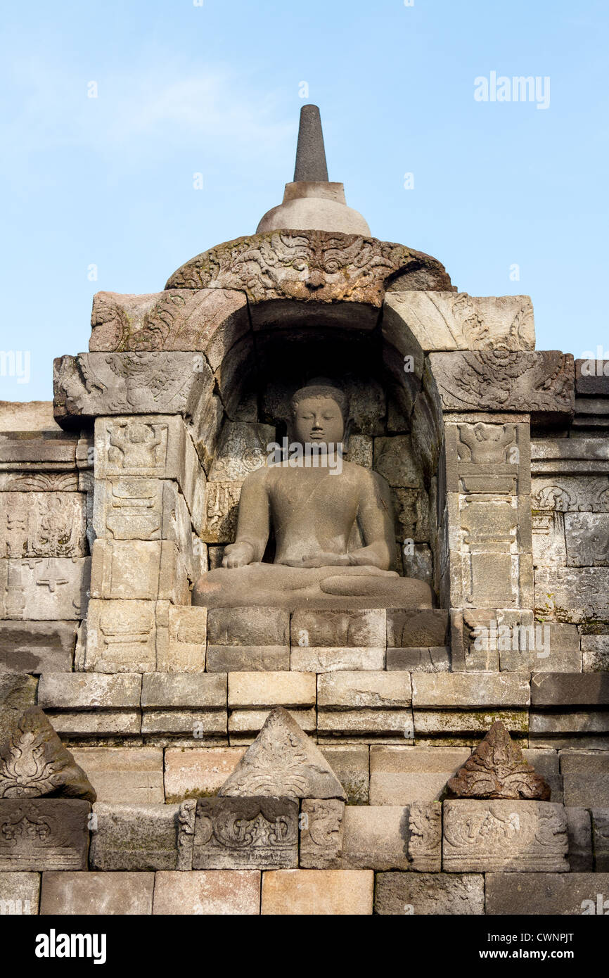 Buddha statue inside inside of Borobudur temple wall, Java island ...