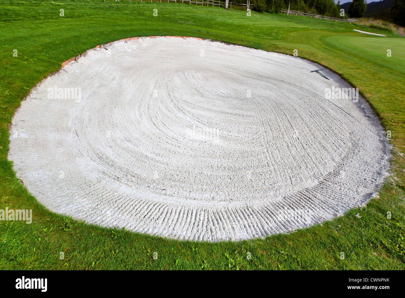Round hole on golf field Stock Photo - Alamy