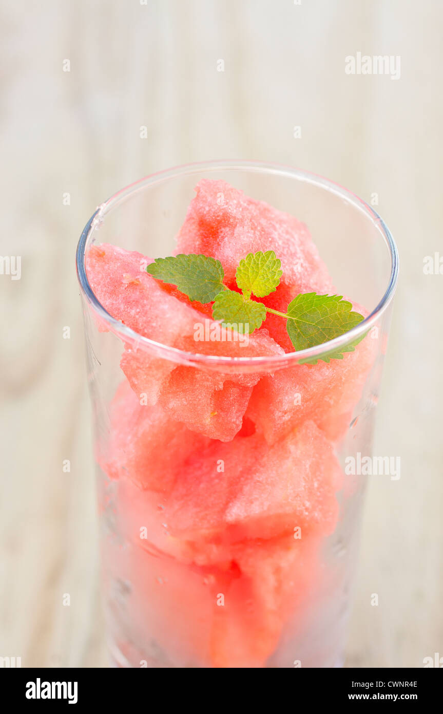 Glass with some pieces of watermelon Stock Photo - Alamy