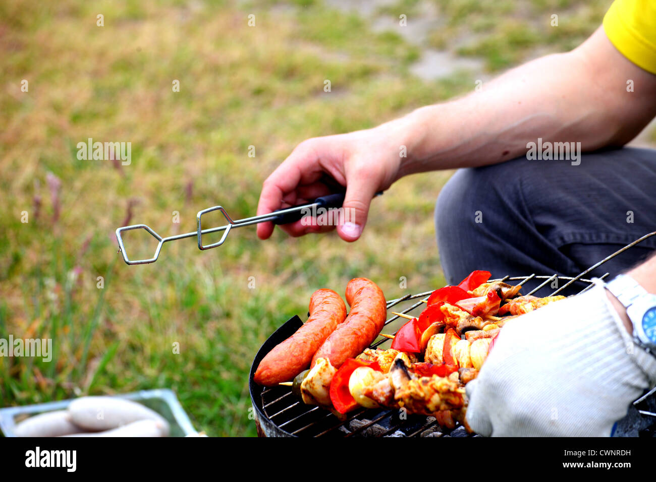 Barbecue with delicious grilled meat on grill BBQ Stock Photo - Alamy