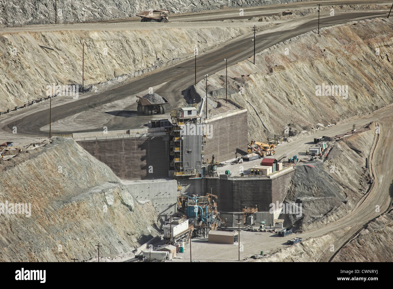 Large mine dump trucks in Kennecott Copper Mine in central Utah. Open ...