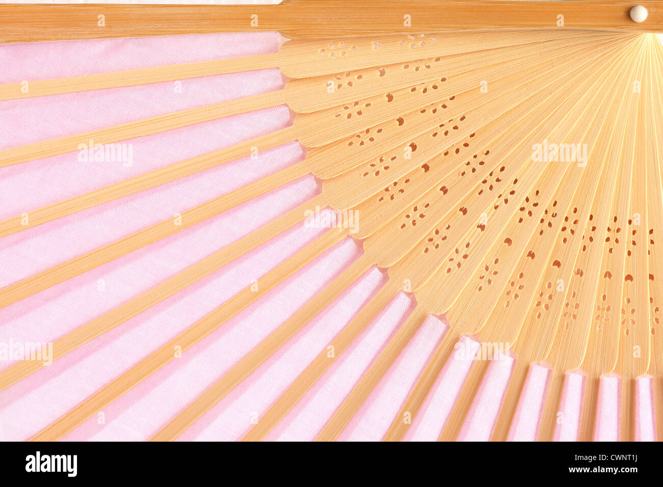 Pink opened fan as a background texture Stock Photo - Alamy