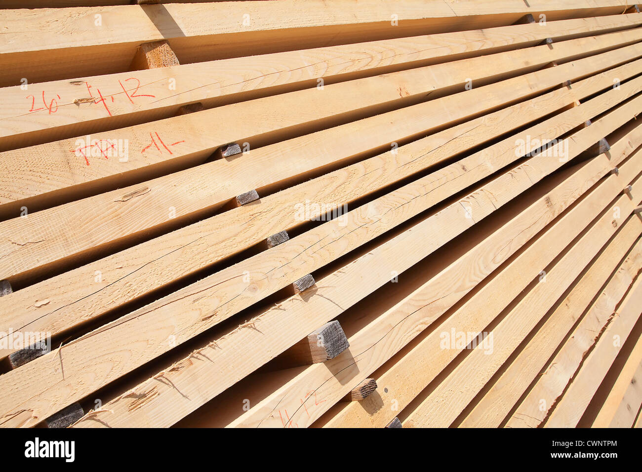 Stack of new wooden studs at the lumber yard Stock Photo - Alamy