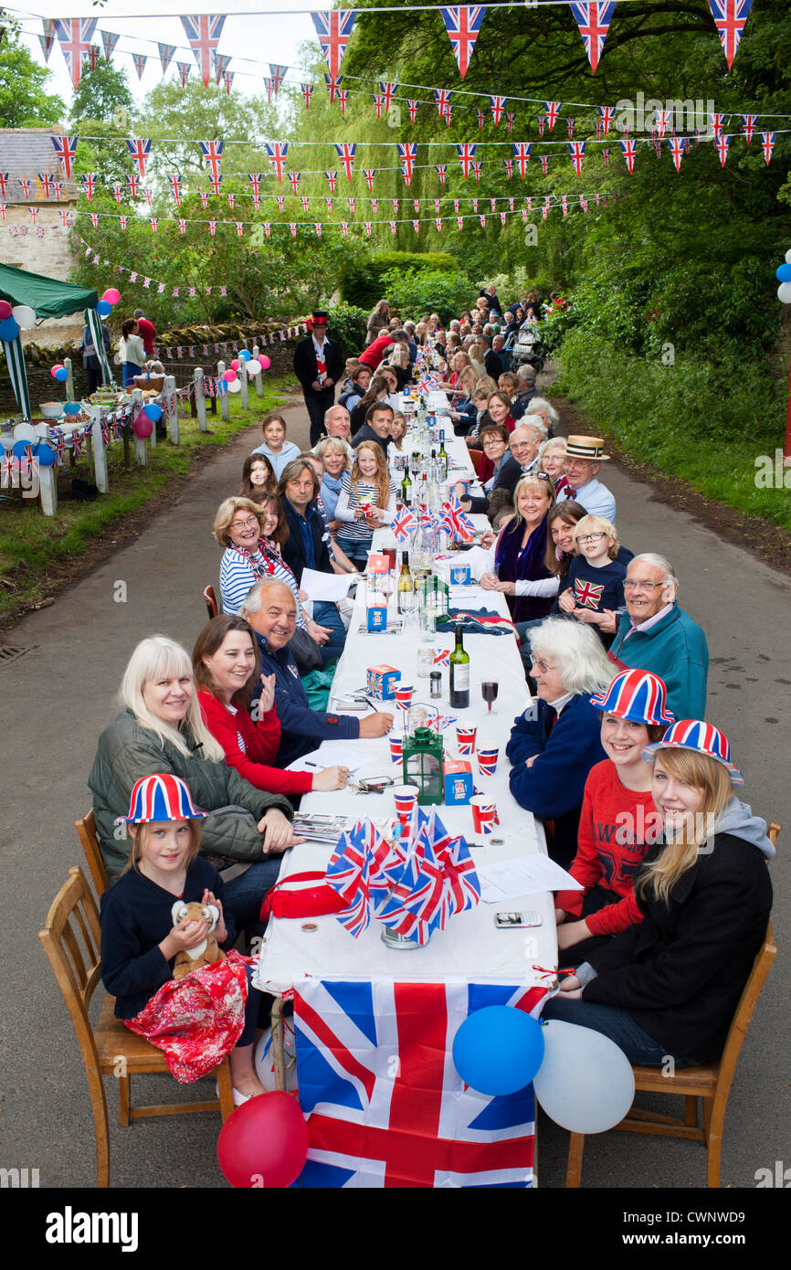 Street party with Union Jack flags and bunting to celebrate Queen's ...